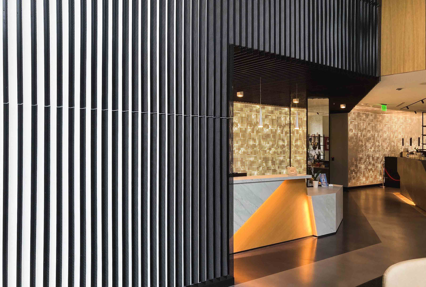 7 Inspirational Custom Perforated Wall Projects for Interior and ...